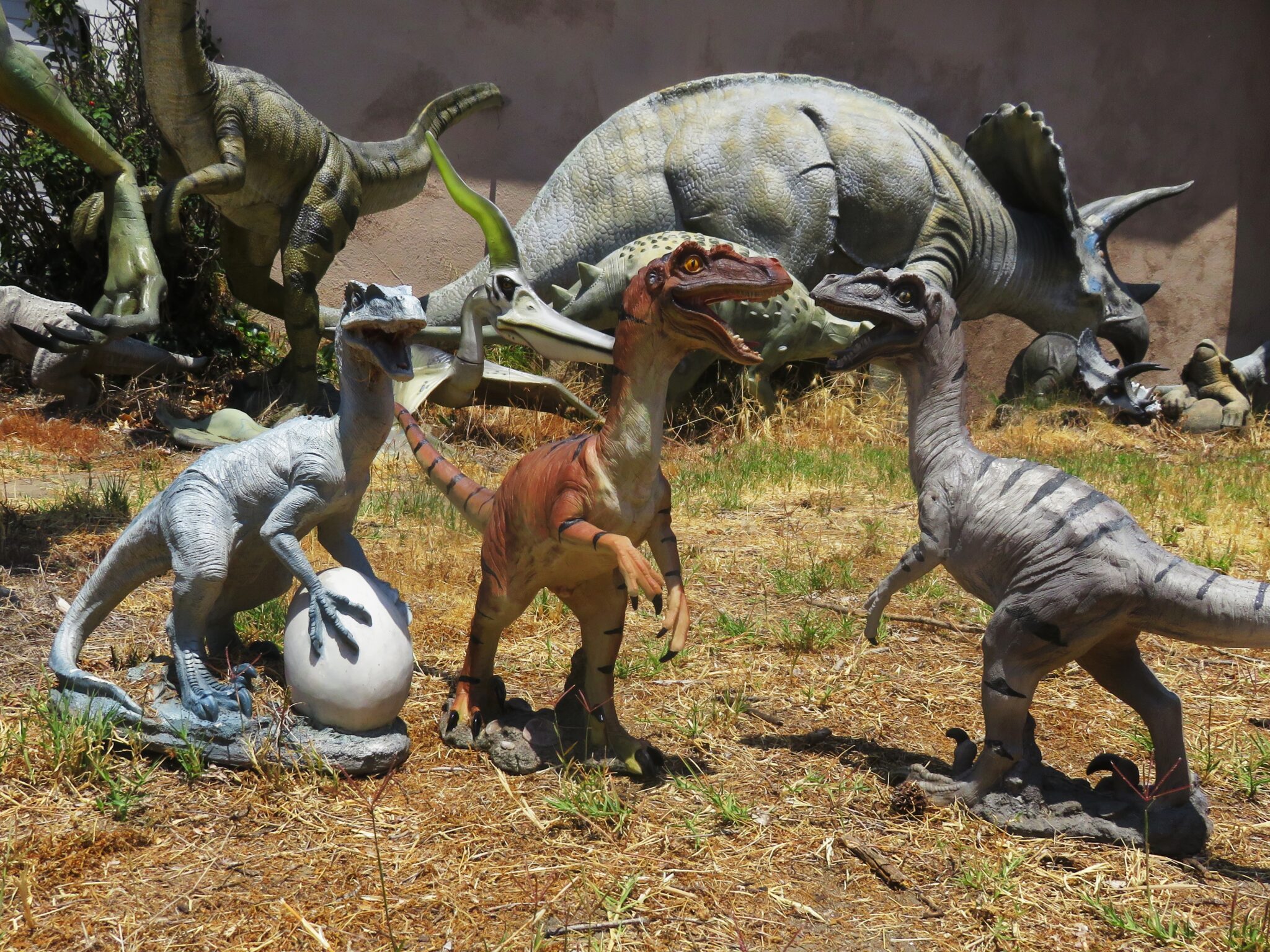 Small Velociraptor Garden Statues